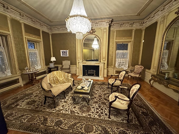 The ladies' reception room whispers of elegant soirées past, where crystal chandeliers and gilded mirrors reflected society's finest in their Sunday best.