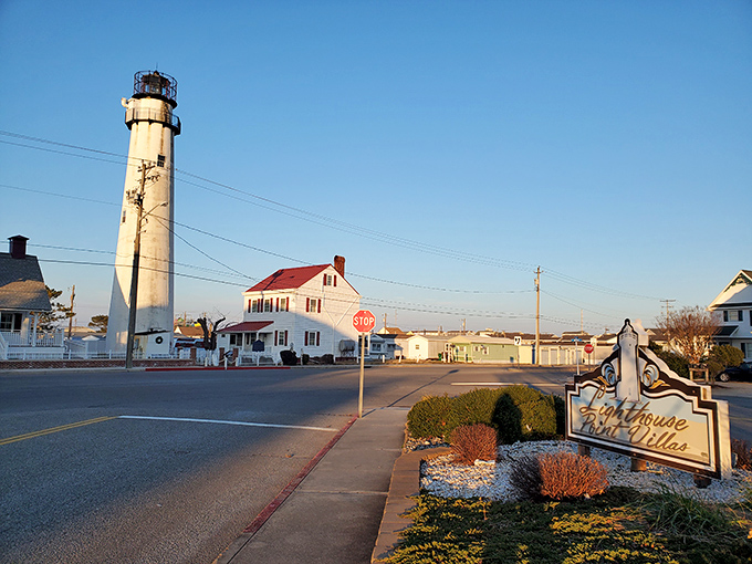 The lighthouse stands proudly at the crossroads, as if to say "You're now entering Delaware – and yes, it's worth the trip!"