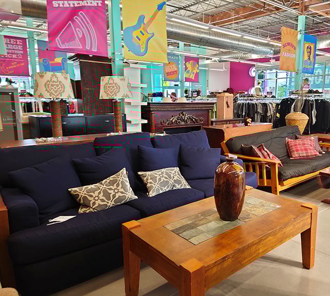 Living room vignettes that whisper "take me home." That navy sofa has seen less action than most display models at those big furniture warehouses.