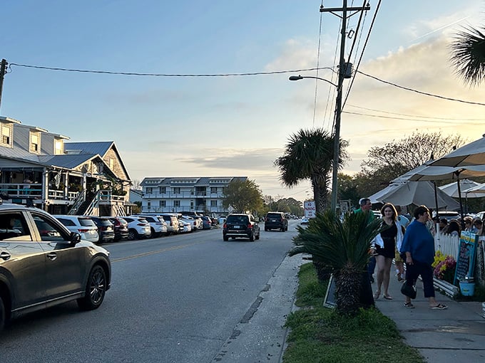 Main Street Sullivan's Island – where locals and visitors mingle outside restaurants that feel more like gathering at a friend's place than dining out.
