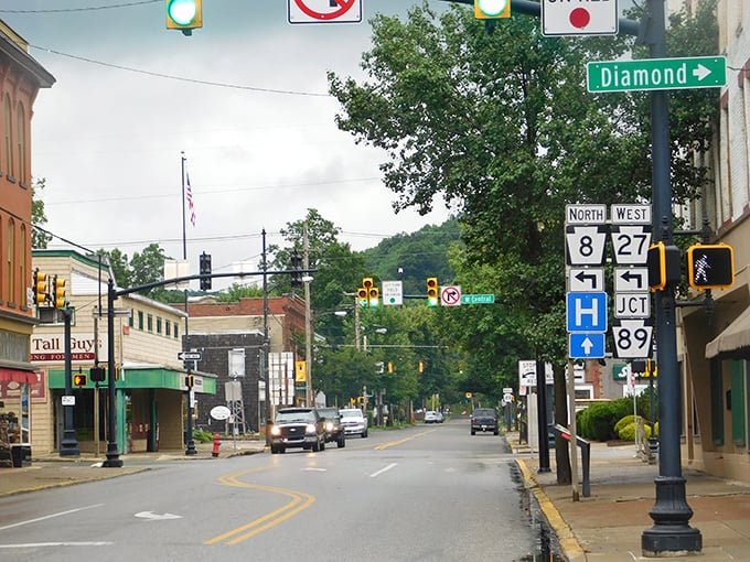 Where highways meet and small-town charm begins—Titusville's intersection of history and everyday life unfolds beneath a canopy of utility lines.