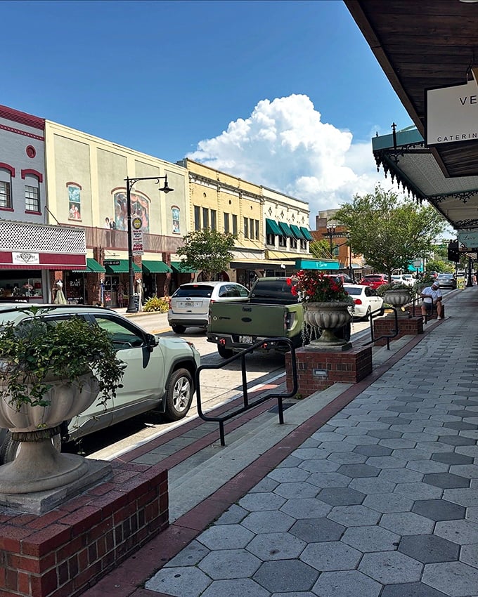 Main Street's colorful storefronts and hexagonal pavers invite leisurely strolls – no "rush hour" exists in this charming small-town tableau.