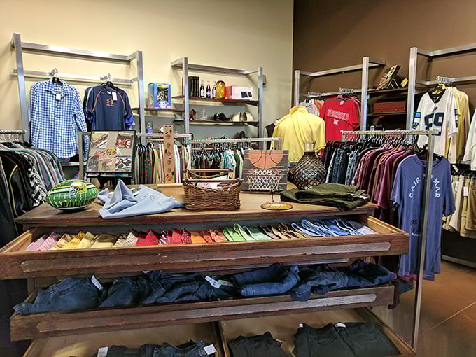 The men's section offers curated selections beyond the bins, where yesterday's designer pieces await their second chapter.