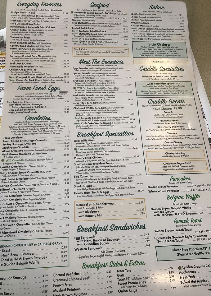 A menu so extensive it could double as light reading material. The benedicts section alone deserves its own table of contents!