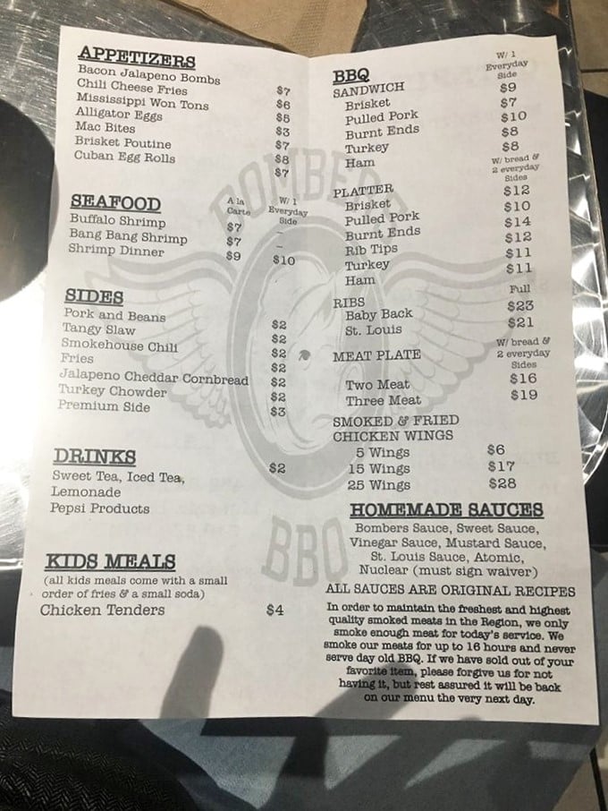 The menu reads like barbecue poetry – a simple, straightforward ode to smoked meats and homemade sauces that promises satisfaction without pretension.