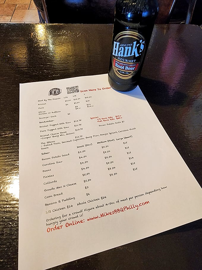 A menu that reads like poetry to meat lovers, accompanied by Hank's root beer—the perfect foil for smoky indulgence.