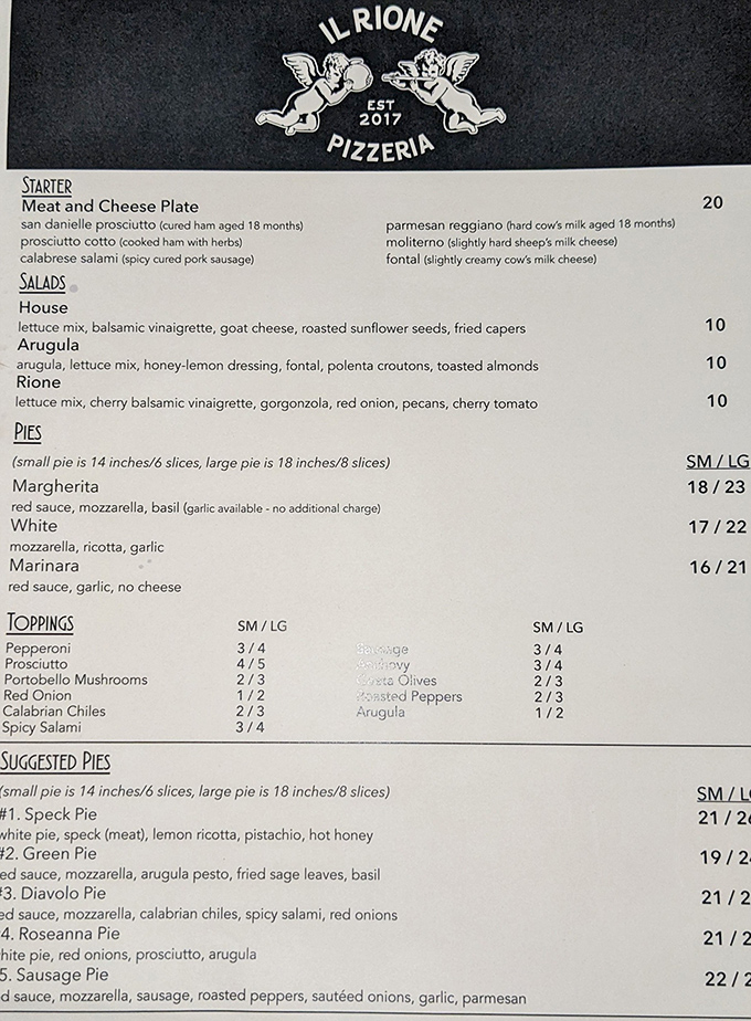 The menu reads like a love letter to pizza perfection. Simple, focused, and guaranteed to make your stomach growl with anticipation.