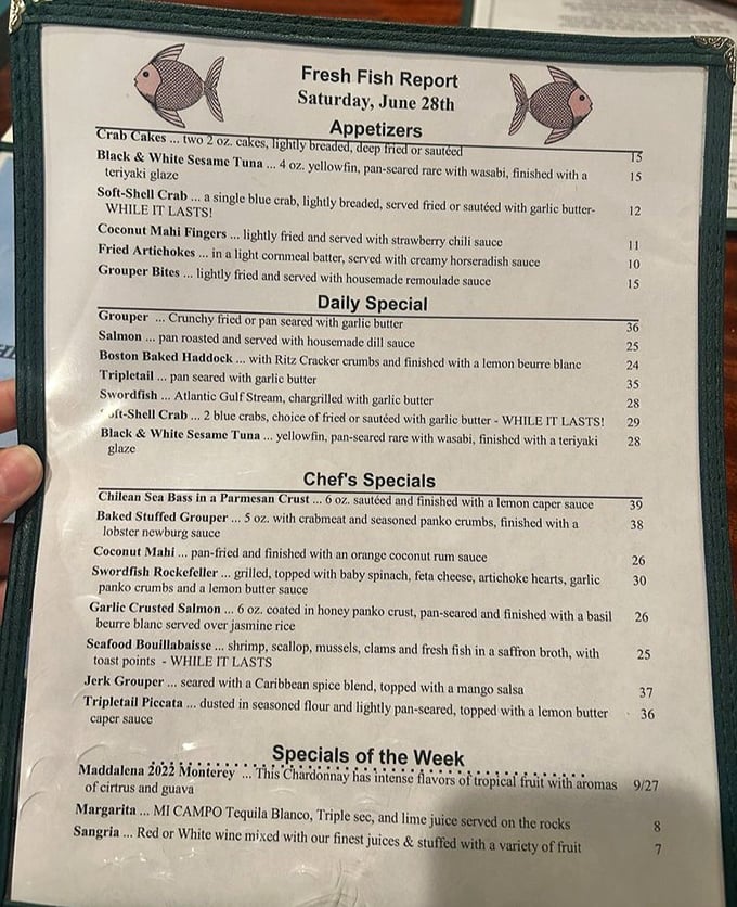 This menu reads like seafood poetry – from soft-shell crab to Chilean sea bass in parmesan crust. Each description is a tiny love letter to the ocean.