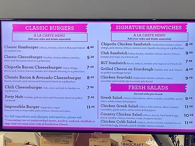 The menu reads like a love letter to American classics. Pink panels frame comfort food favorites that have survived every food trend for good reason.
