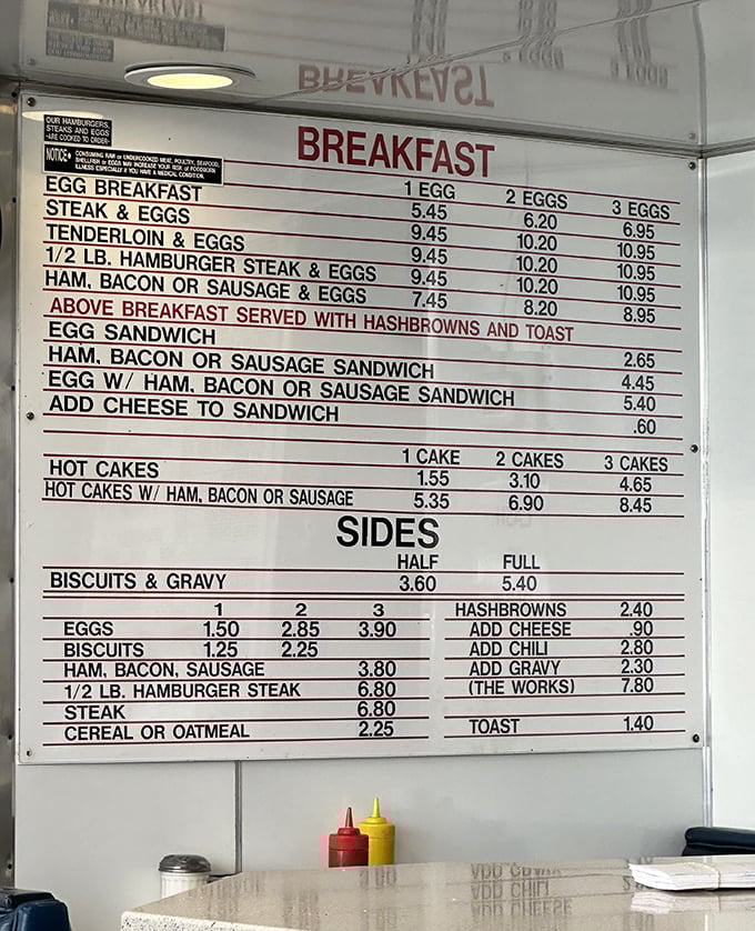 This no-nonsense menu board tells you everything you need to know—breakfast that'll fuel your day and burgers that'll make your soul sing.