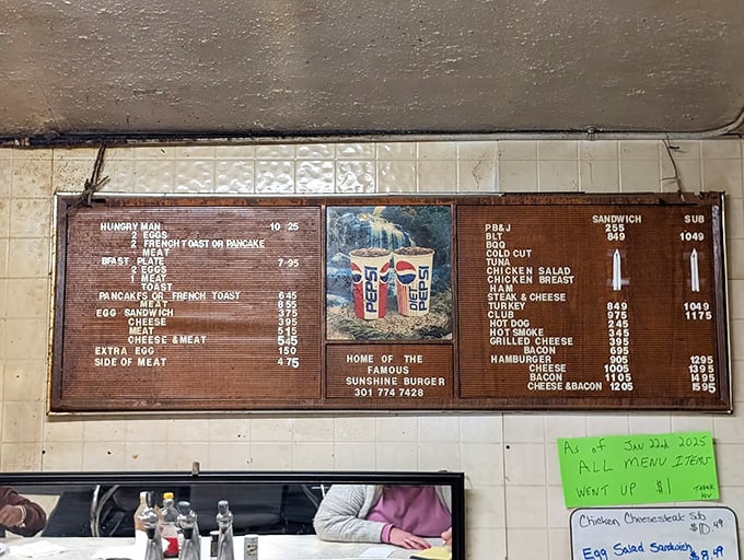 The hand-painted menu board tells you everything you need to know—this place isn't about fancy descriptions, just honest food done right.