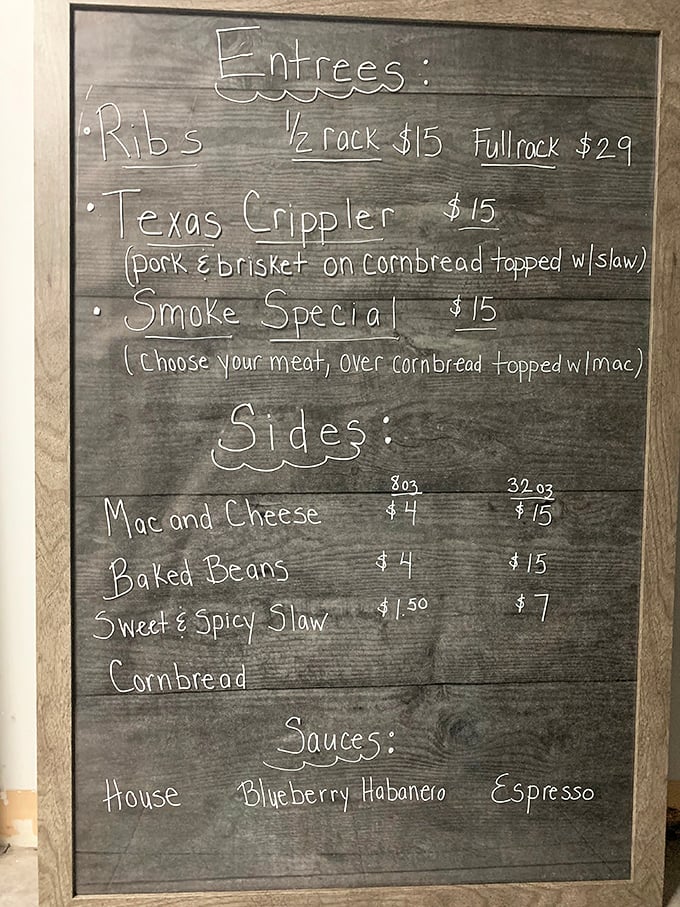 The chalkboard menu – barbecue's version of sacred text, promising smoky revelations and difficult decisions ahead.