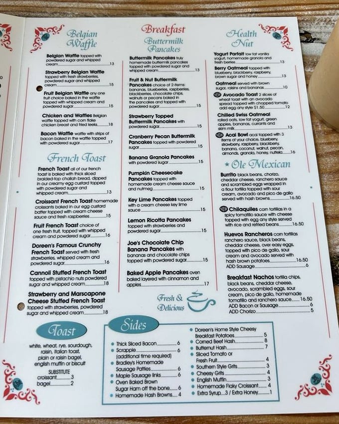 The menu reads like breakfast poetry—Belgian waffles, stuffed French toast, and pancakes that could make a cardiologist weep.