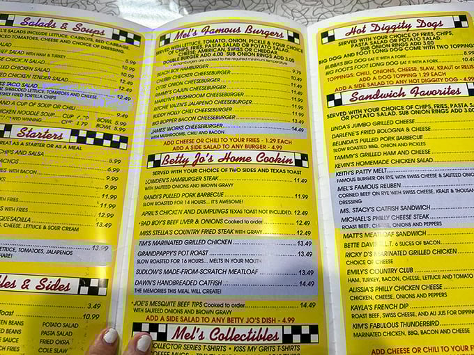 The menu reads like a love letter to comfort food, with each yellow page offering delicious possibilities that make decision-making delightfully difficult.