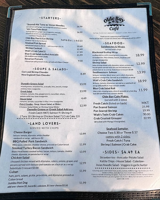 The menu reads like a love letter to the Gulf—seafood takes center stage while "Land Lovers" options ensure nobody leaves hungry.