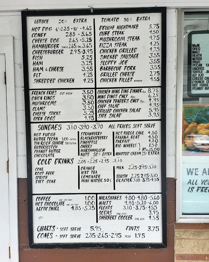 The menu board—a masterpiece of simplicity—showcases a lineup of classics that have survived every food trend from fondue to foam without needing to change a thing.The menu board—a masterpiece of simplicity—showcases a lineup of classics that have survived every food trend from fondue to foam without needing to change a thing.