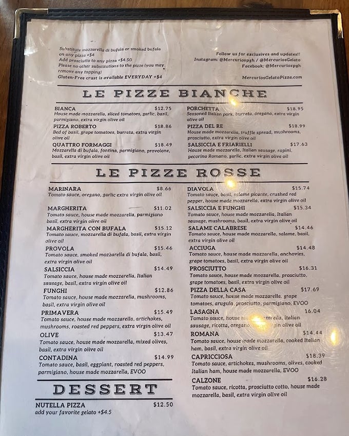 The menu reads like Italian poetry – "Le Pizze Bianche" and "Le Pizze Rosse" offering a tour of Italy's finest combinations without the airfare.