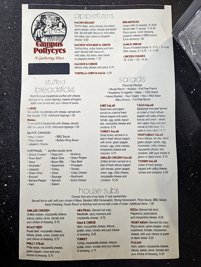 The sacred text! Campus Pollyeyes' menu reads like a love letter to comfort food, with those legendary stuffed breadsticks taking center stage where they belong.