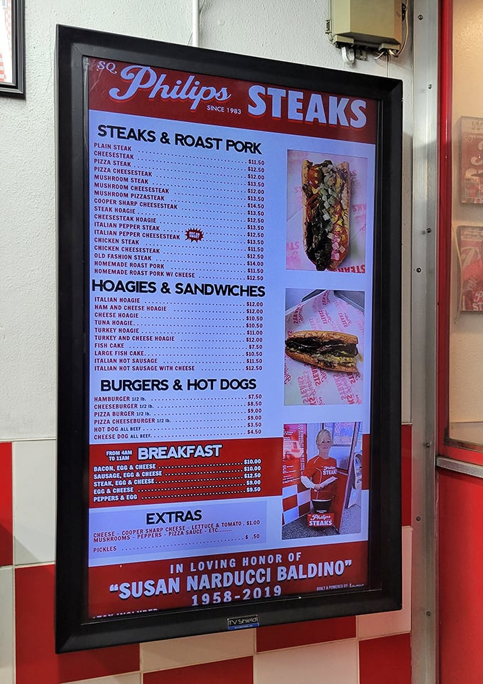 A menu board that gets straight to the point: no foams, no reductions, no pretense—just honest Philadelphia sandwiches that deliver.