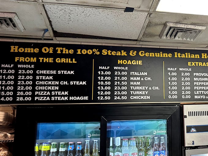 "Home of the 100% Steak" isn't just a slogan—it's a promise written in gold. The menu board has remained gloriously unchanged for decades.