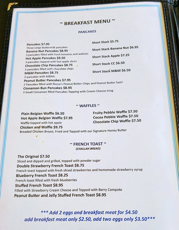 This menu isn't just a list of food—it's a roadmap to happiness. The French toast section alone could make a cardiologist weep with joy.