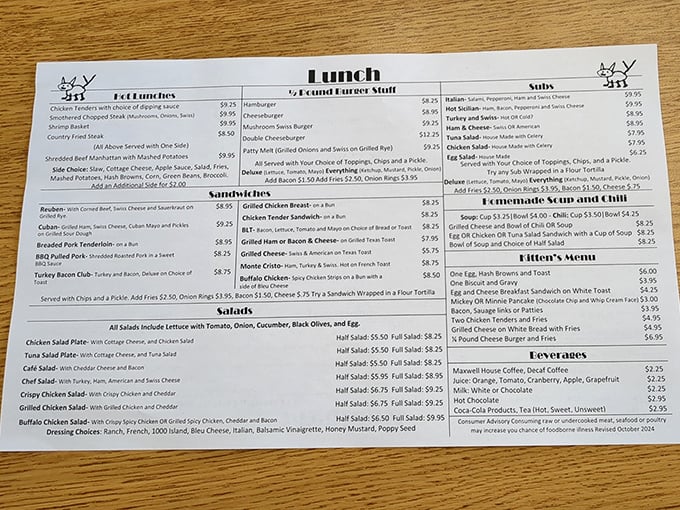 A menu that doesn't need fancy fonts or pretentious descriptions—just honest food that speaks for itself. The laminated simplicity is refreshingly straightforward.