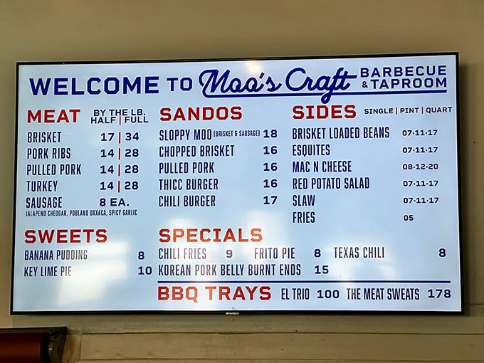 The menu board at Moo's reads like barbecue poetry – brisket, ribs, pulled pork, and sides that make choosing just one a Sophie's Choice for food lovers.