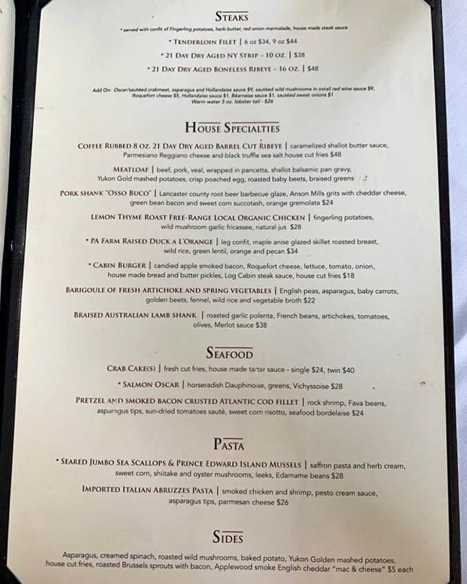 A menu that reads like a love letter to carnivores. The 21-day dry-aged steaks aren't just a meal – they're a religious experience with silverware.