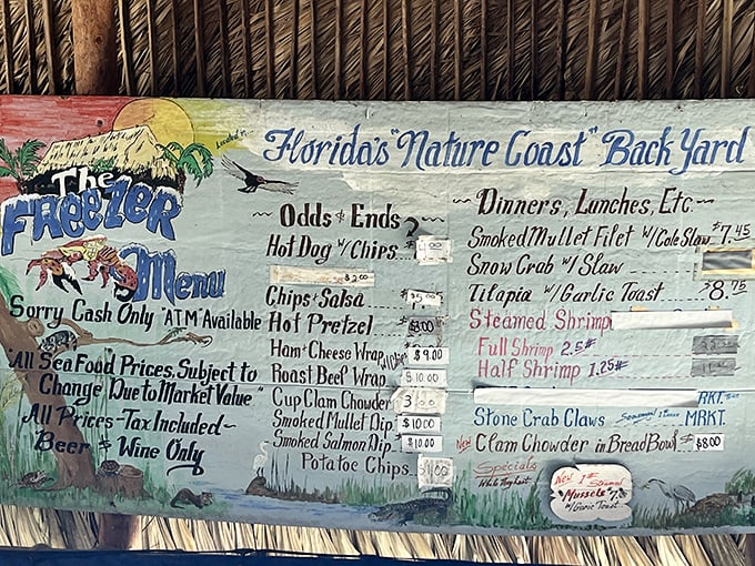 The hand-painted menu board—Florida's culinary constitution. Simple offerings with no pretense, just the promise of seafood that tastes like it jumped from the Gulf moments ago.