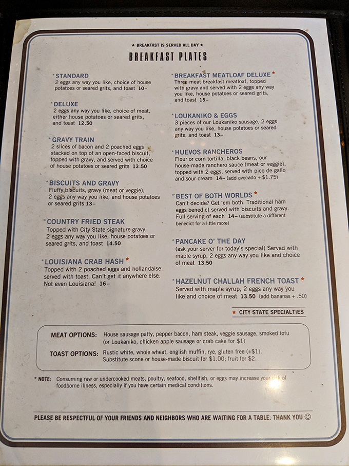 This menu isn't just reading material—it's a roadmap to happiness. The "Gravy Train" and "Louisiana Crab Hash" aren't just dishes, they're destinations.