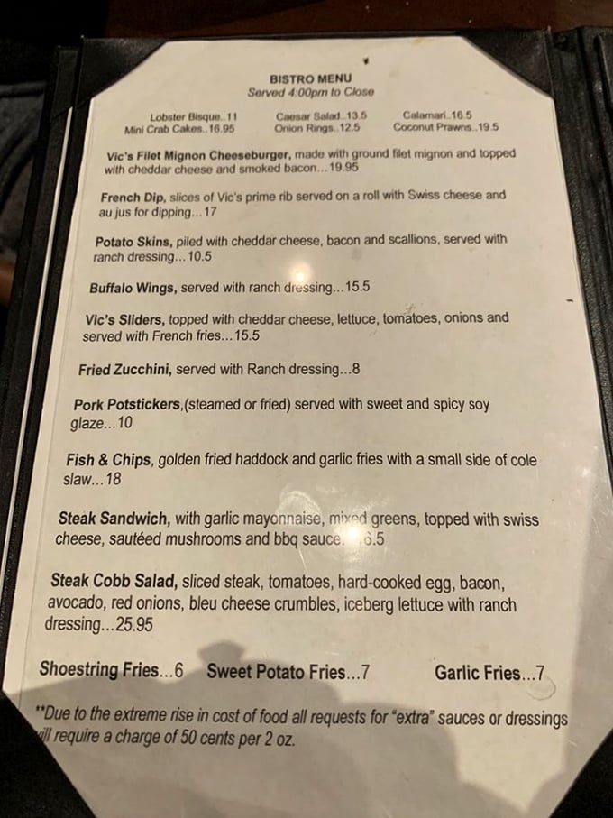 The bistro menu reads like a love letter to comfort food classics. From lobster bisque to Vic's sliders, each item seems designed to make you forget about tomorrow's diet plans.
