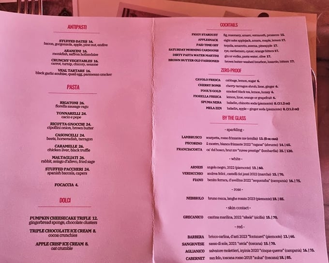 A menu that doesn't try to dazzle with quantity but stuns with quality. Each item reads like a love letter to Italian cuisine.