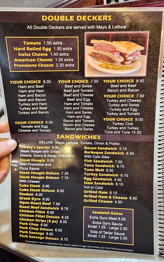 The menu reads like a love letter to comfort food—Double Deckers stacked high enough to require jaw exercises before attempting.