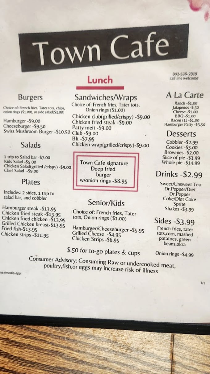 The menu tells the real story—no fancy fonts or pretentious descriptions, just honest food that makes you want to order one of everything.