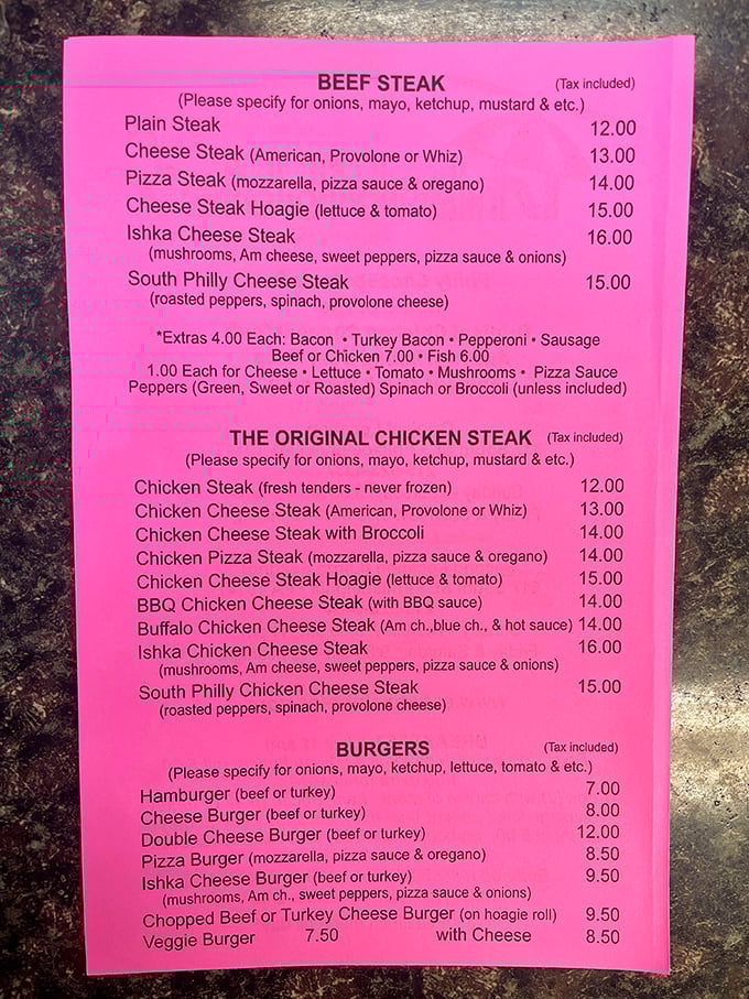 The pink menu is like a love letter to Philadelphia's sandwich culture—simple, straightforward, and utterly irresistible.