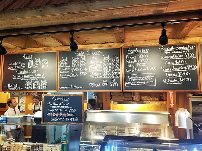 The chalkboard menu – where life-changing decisions are made daily. No fancy fonts needed when the food speaks this loudly.