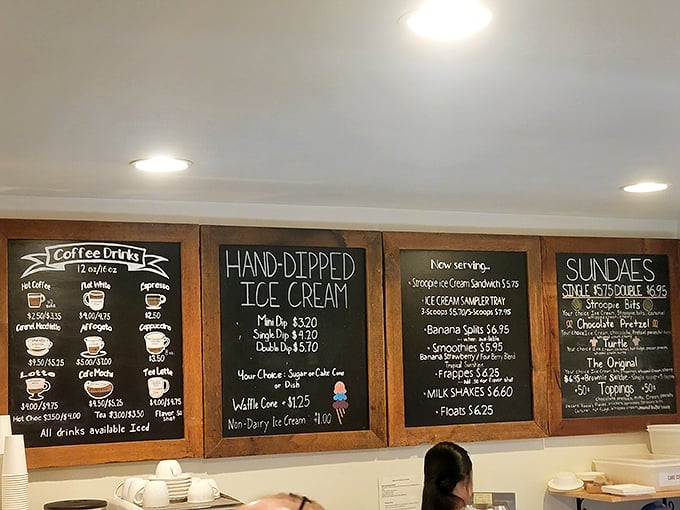 The chalkboard menu reads like poetry for your taste buds—coffee, ice cream, and sundaes all vying for attention.