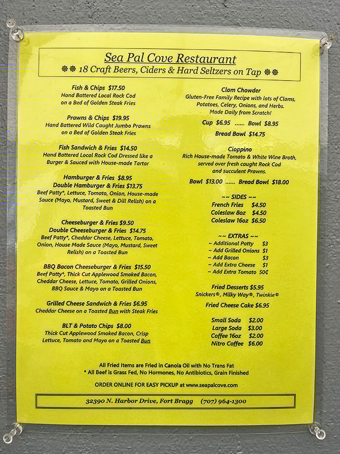 The menu board tells you everything you need to know—this place prioritizes what matters: fresh seafood, cold beer, and zero pretension.