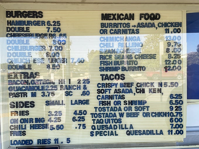 A menu board that reads like poetry to the hungry. Two culinary traditions—American classics and Mexican favorites—living harmoniously on one glorious wall.