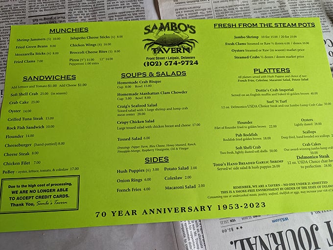 That bright green menu is like a treasure map where X marks the spot for some of Delaware's finest seafood offerings.