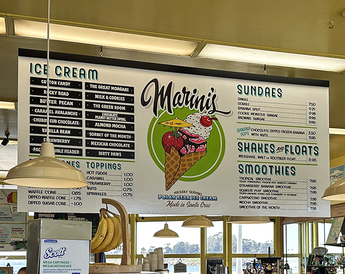 The menu board at Marini's reads like poetry for your sweet tooth. Each flavor name is a promise of momentary bliss.