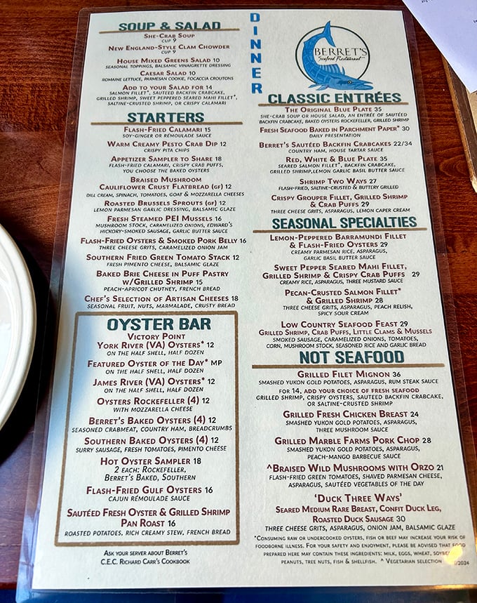 The menu reads like seafood poetry—a siren song of oysters, crab cakes, and maritime treasures that makes choosing just one dish nearly impossible.