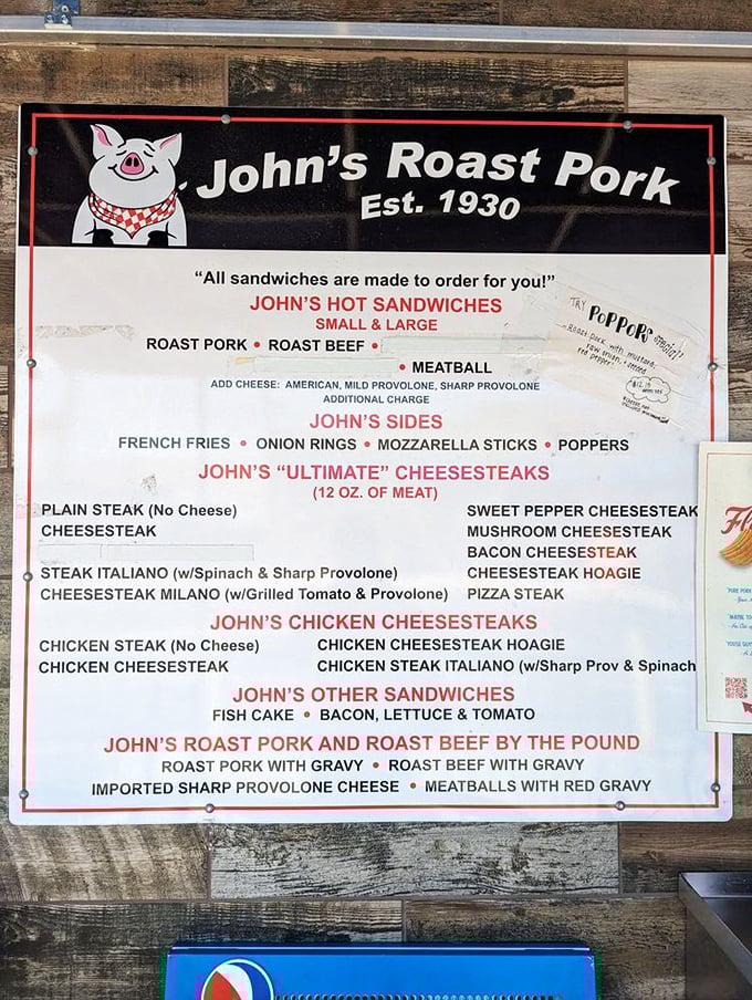 The menu board tells a story of sandwich possibilities that would make a poet weep. Each option promises a different path to culinary bliss.