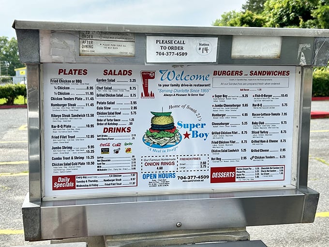 The menu board tells the whole story—Super Boy burgers reign supreme, but don't sleep on those golden fried chicken plates that could make your grandmother jealous.
