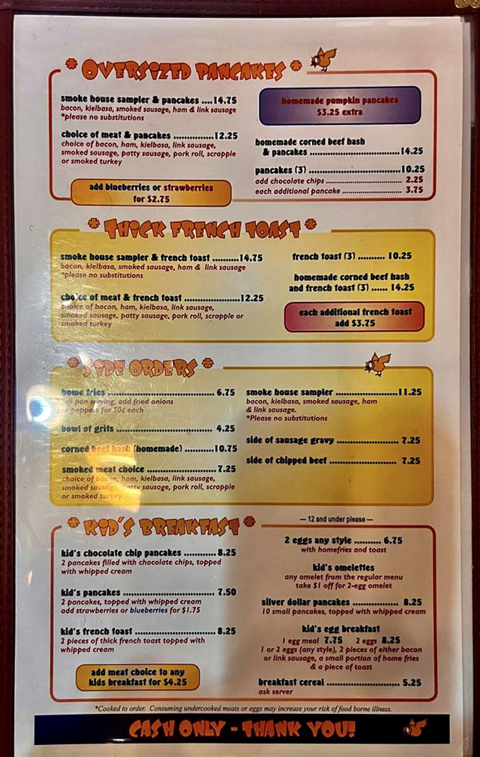 The menu reads like a love letter to American breakfast classics. "Oversized Pancakes" isn't just a description—it's a delicious warning.