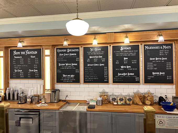 The menu board isn't just a list—it's a roadmap to happiness with destinations like "Milkshakes & Malts" and the promised land of "Sundaes."