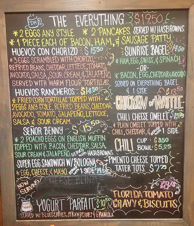 The chalkboard menu reads like a love letter to breakfast. From "The Everything" to "Huevos Rancheros," decisions have never been so deliciously difficult.