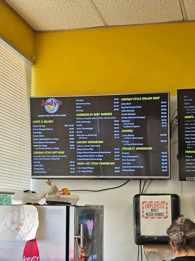The menu board at Jody's—a roadmap to happiness featuring Chicago dogs, Italian beef, and other Windy City classics.