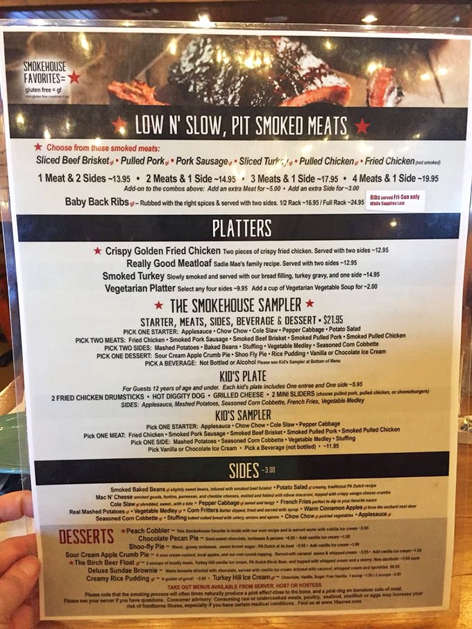 The menu reads like barbecue poetry – "Low N' Slow, Pit Smoked Meats" isn't just a description, it's a solemn promise.