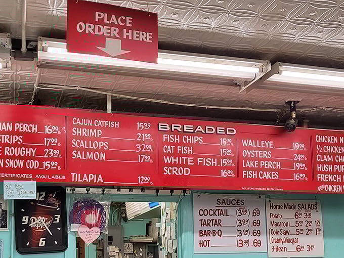 The red menu board reads like a love letter to seafood lovers. Decisions, decisions – it's the most delicious kind of stress.